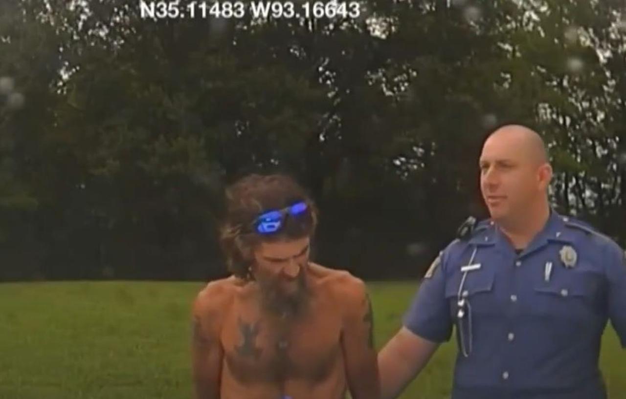 Police Dashcam Footage Captures Runaway Driver Fleeing Officer
