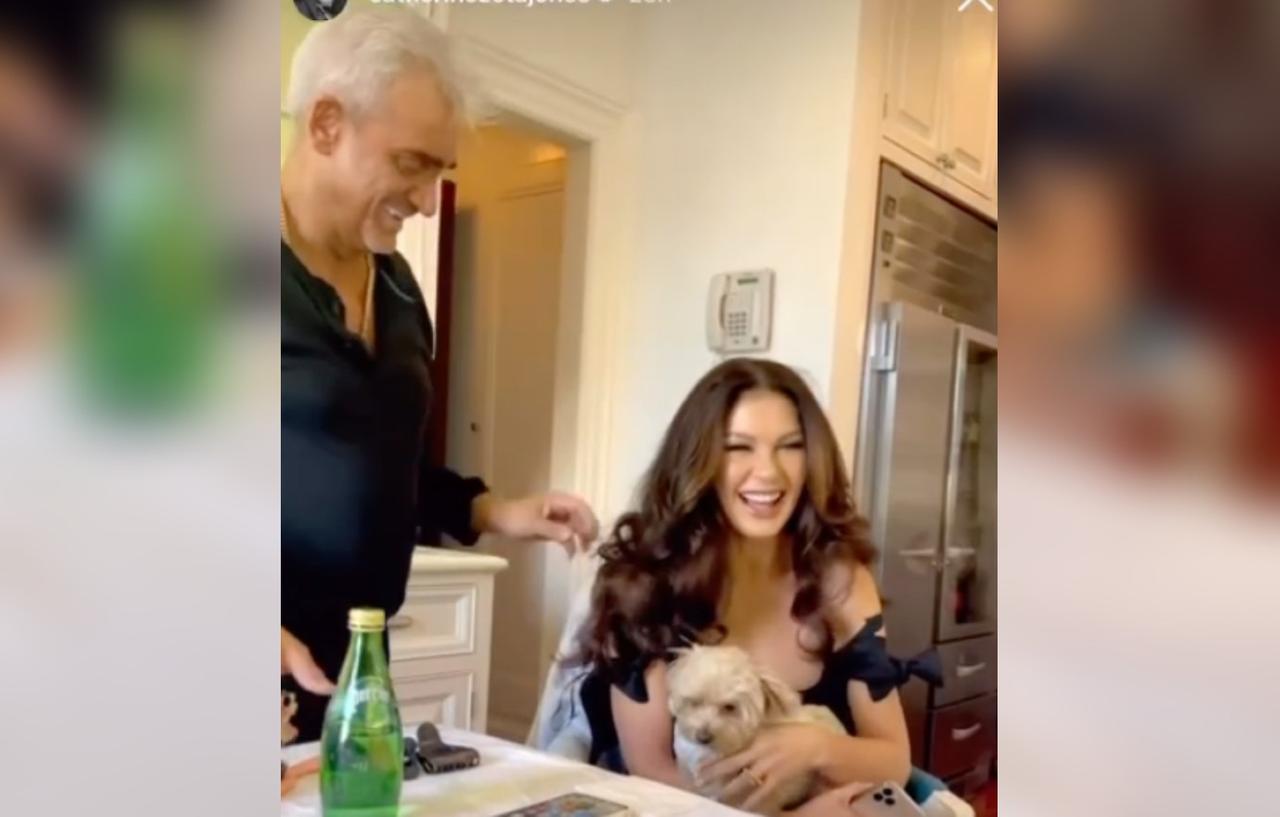 Catherine Zeta-Jones Sings To Her Dog While Getting Hair Styled: Photo
