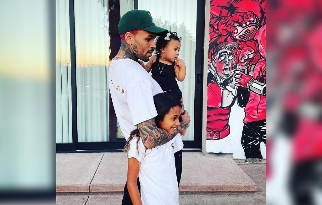 Chris Brown Snuggles With Daughter Lovely In Rare Photo