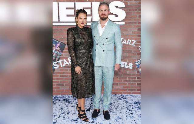 Stephen Amell Packs On PDA With Wife On Red Carpet After Blowout