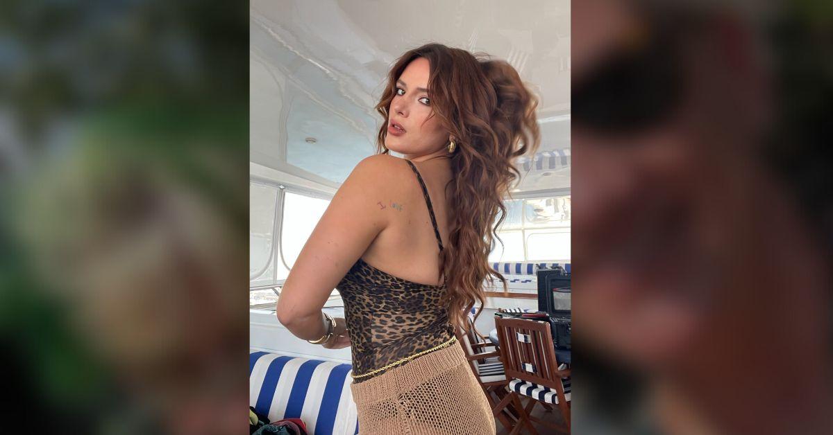 Bella Thorne Flaunts Her Backside In Racy Leopard Print Swimsuit Photo