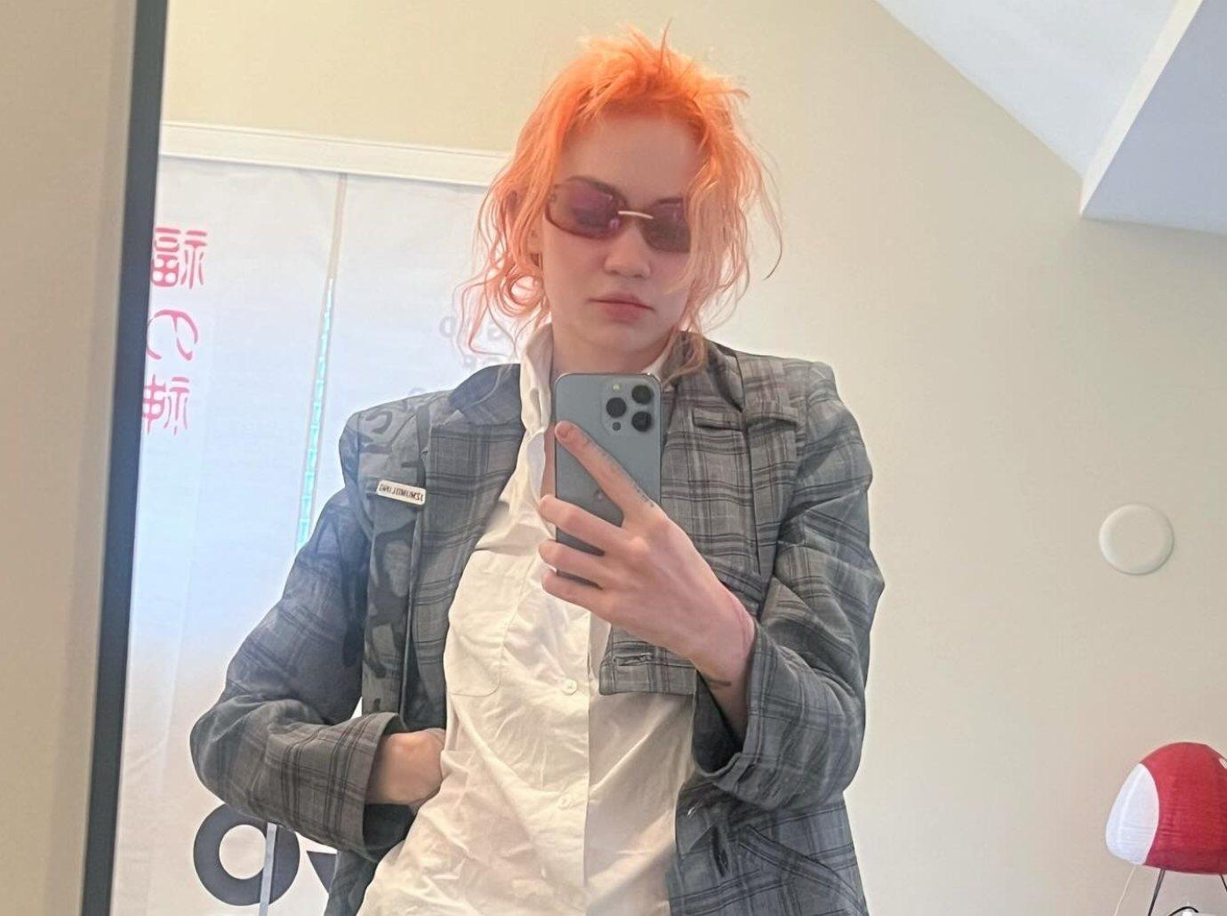 Grimes Claims She 'Became Way Less Gay' After Giving Birth