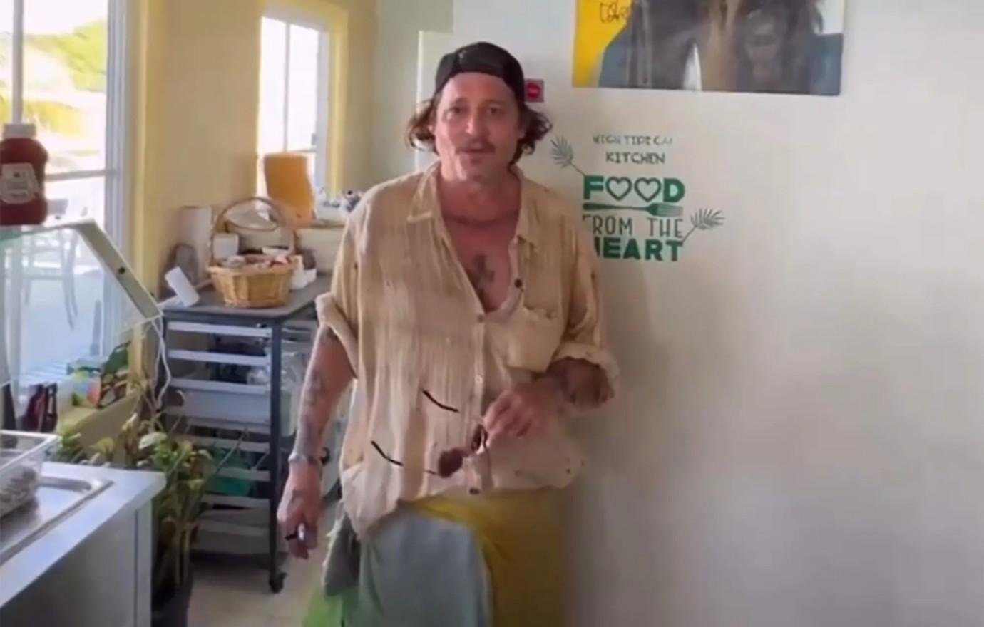Johnny Depp Shows Off New Teeth In New Video