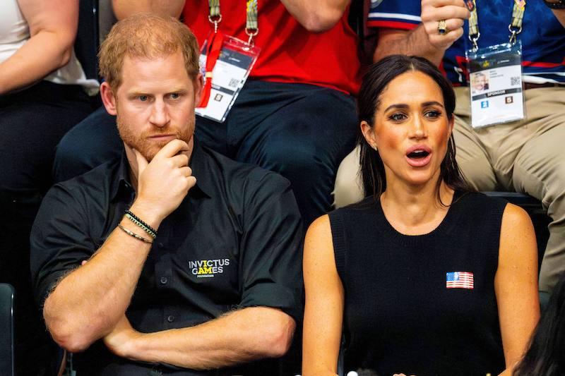 Prince Harry & Meghan Markle 'Scrambling' To Pay Their Bills