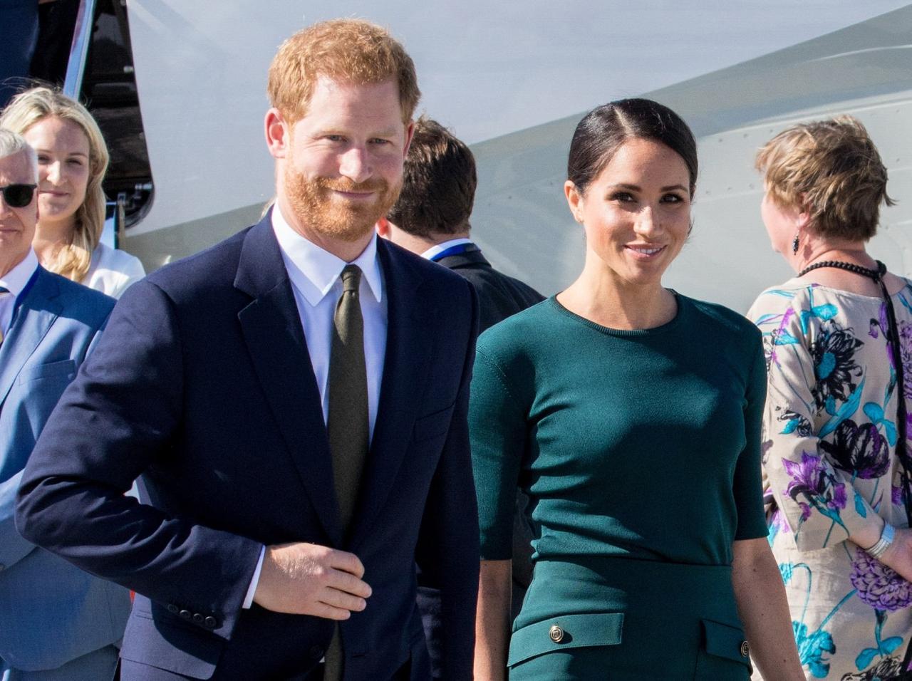 Prince Harry Accused Of Wearing Heels In New Photo With John Travolta