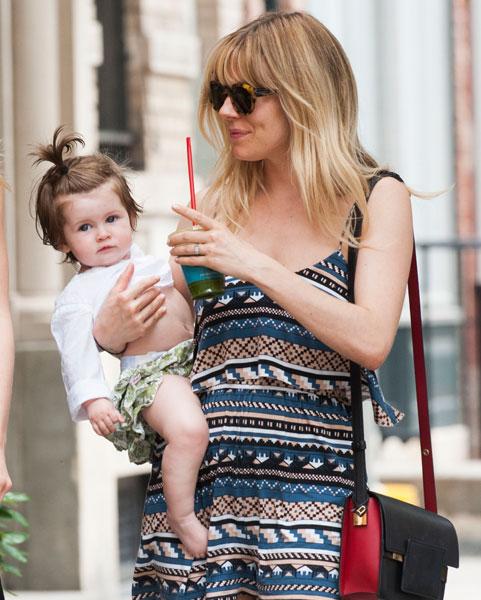 OK! Quick Pics: Khloe Kardashian Gives Kisses, Bradley Cooper Struts ...