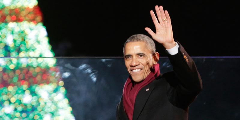 President Barack Obama Dresses As Santa, Hands Out Gifts To Kids At ...