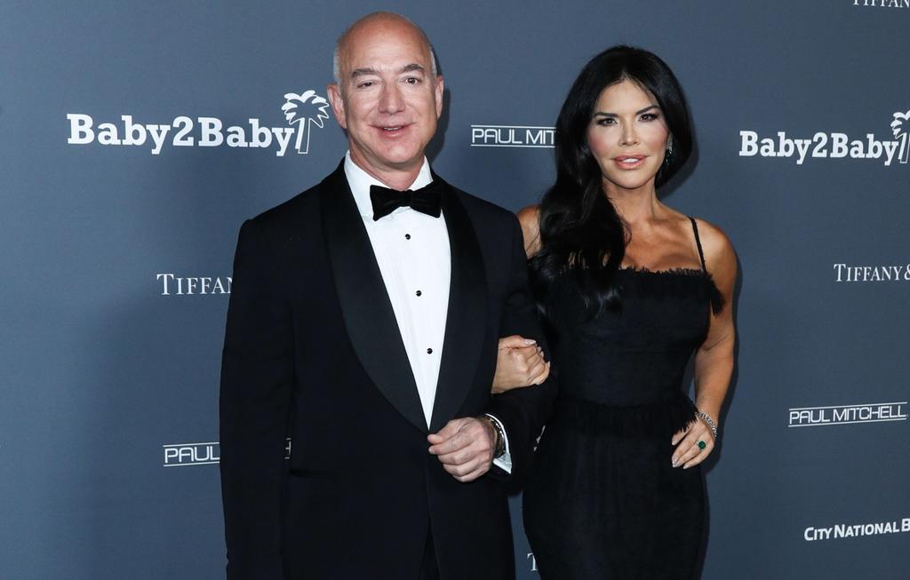 Jeff Bezos & Girlfriend Lauren Sanchez Caught Cuddling At Fashion Show